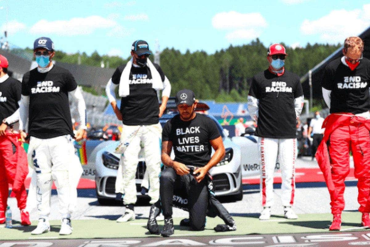 Formula One drivers kneel in protest prior to first race
