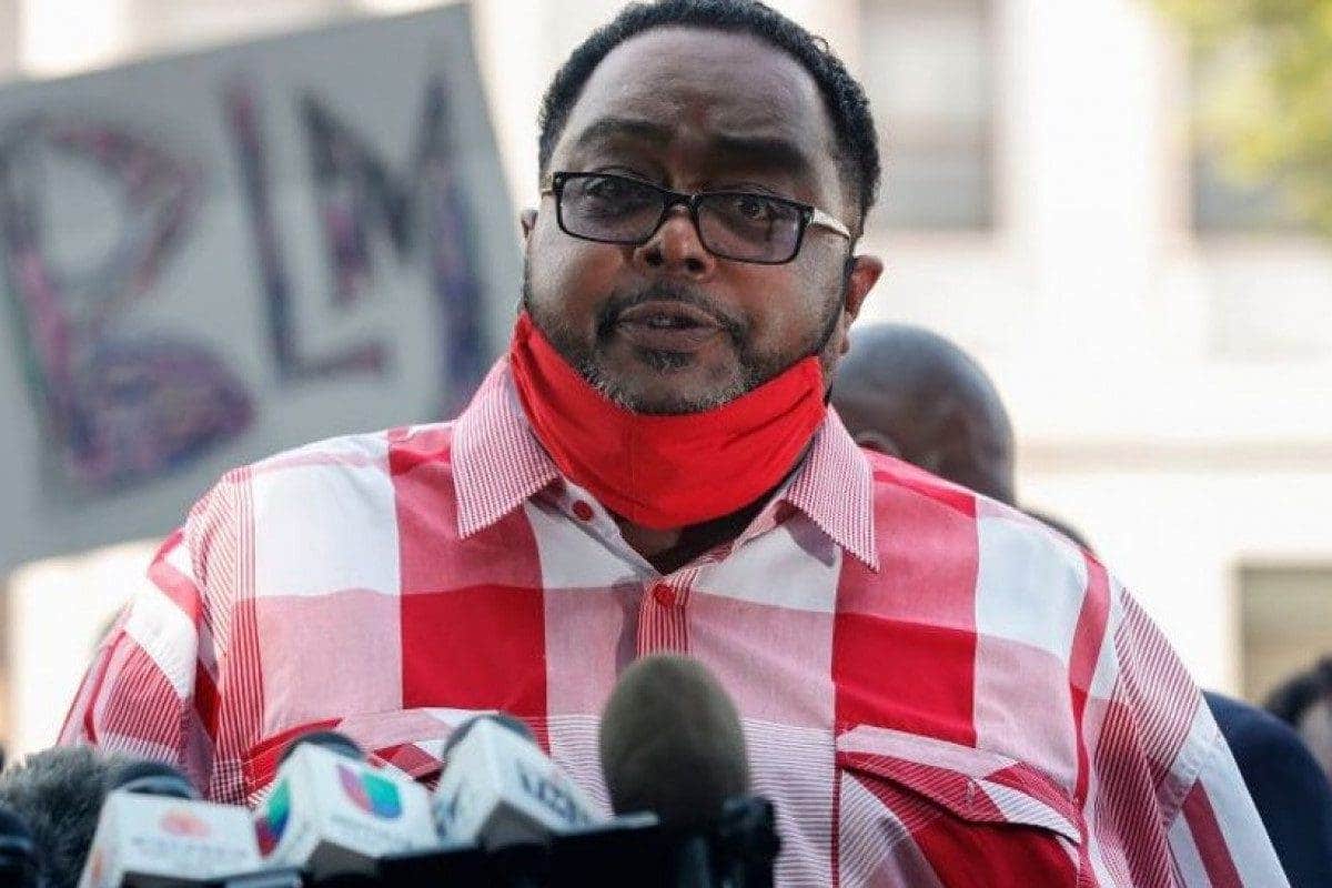 Jacob Blake’s father says his son is handcuffed to the hospital bed