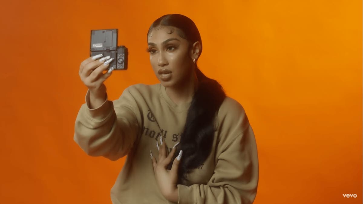 Queen Naija reflects on chapters of her life in new “Pretend” video