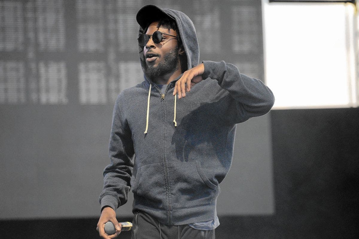 TDE fans speculate that the label's secret release is by Isaiah Rashad