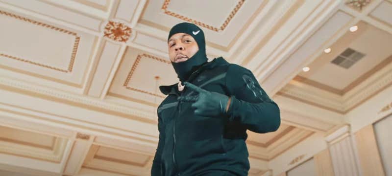 Rowdy Rebel and Fivio Foreign team up for trouble in new "Paid Off" video