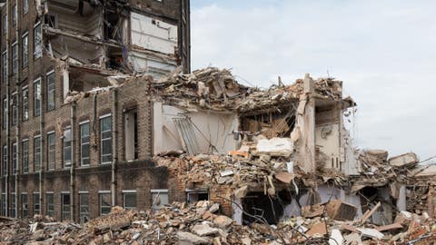 Rescue crews search for residents after Iowa building collapses